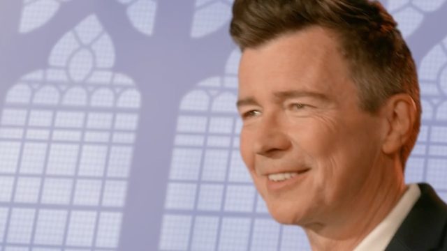 Rick Astley Recreates His Iconic Music Video for AAA | 15 Minute News