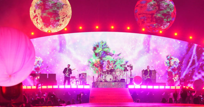 Coldplay’s Sustainability Partnership With DHL Matters
